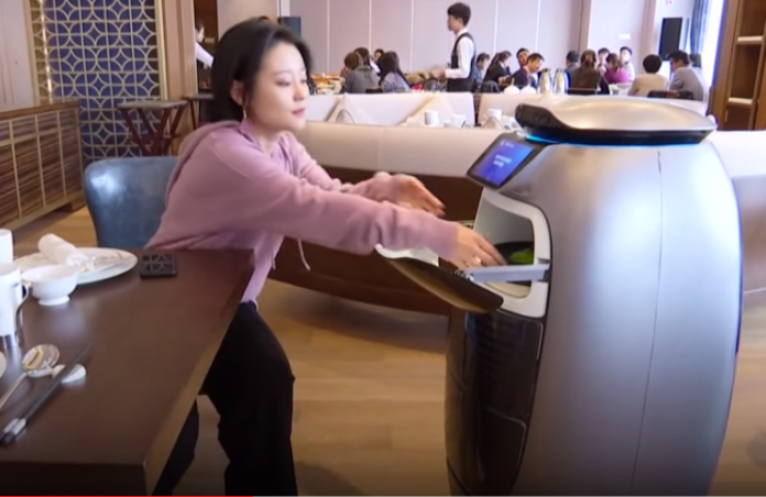 AI and robots serve guests at Alibaba’s futuristic FlyZoo Hotel, China ...