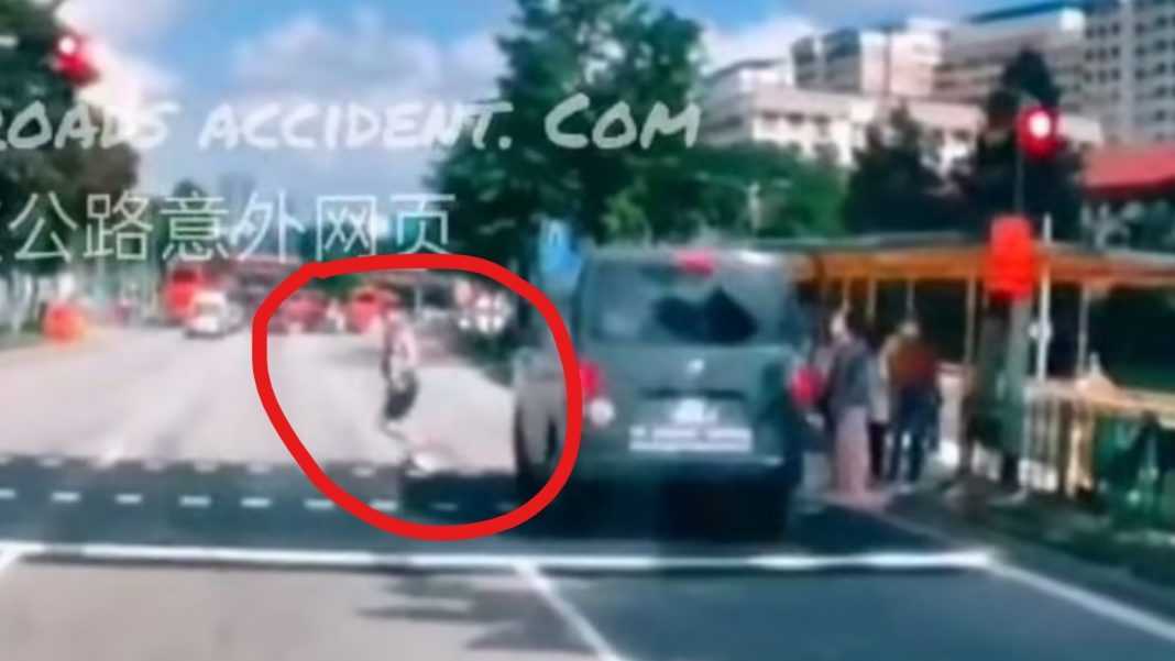 Van runs through red light and narrowly misses hitting man crossing ...
